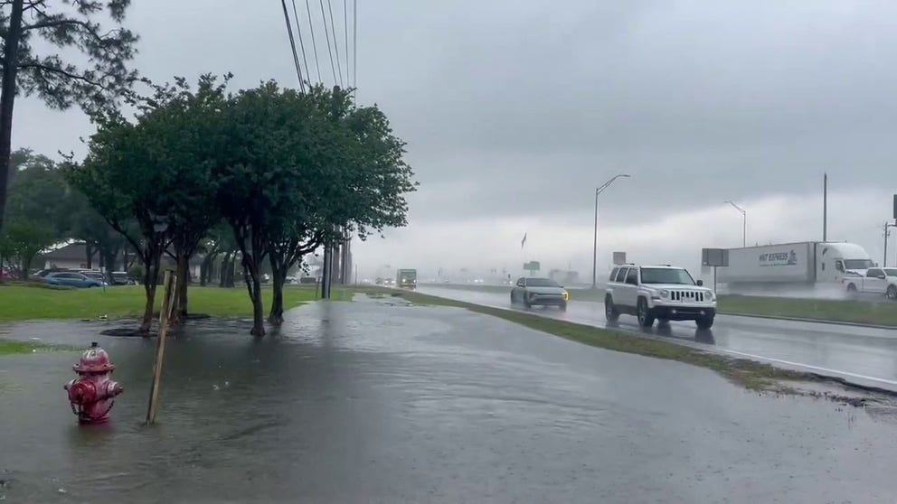 Residents in Baytown, Texas, were met by heavy rain and winds Wednesday ...