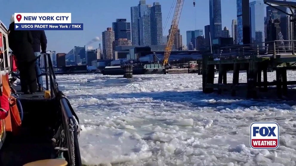 The U.S. Coast Guard free a trapped NYPD boat in ice | Latest Weather ...
