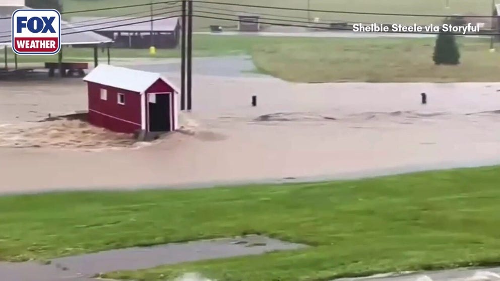 Watch: Torrential rain inundates southern Indiana, turns Lanesville ...