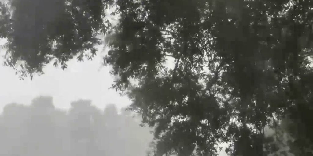 Strong thunderstorm with high winds moves over Orlando, Florida ...