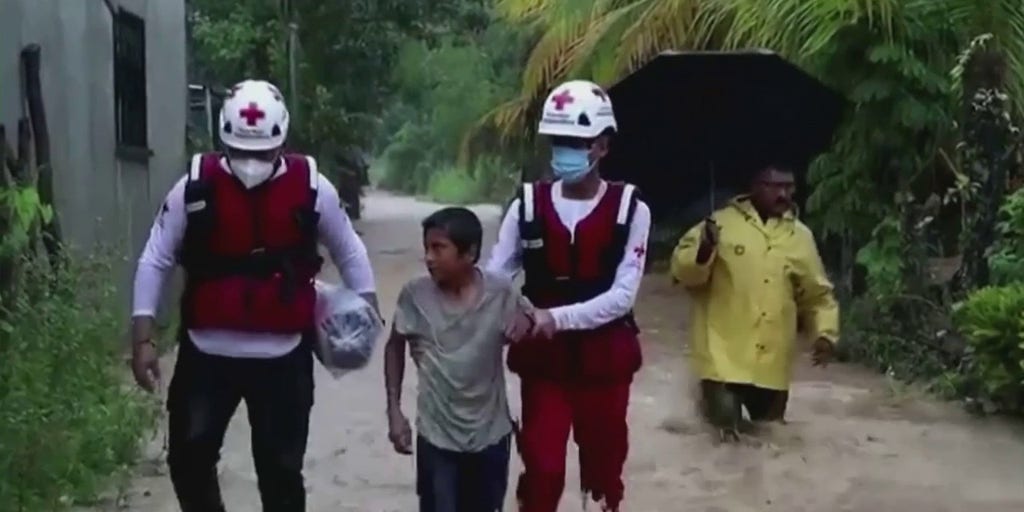 Watch: Torrential rain from Hurricane Julia leads to flooding, rescues ...