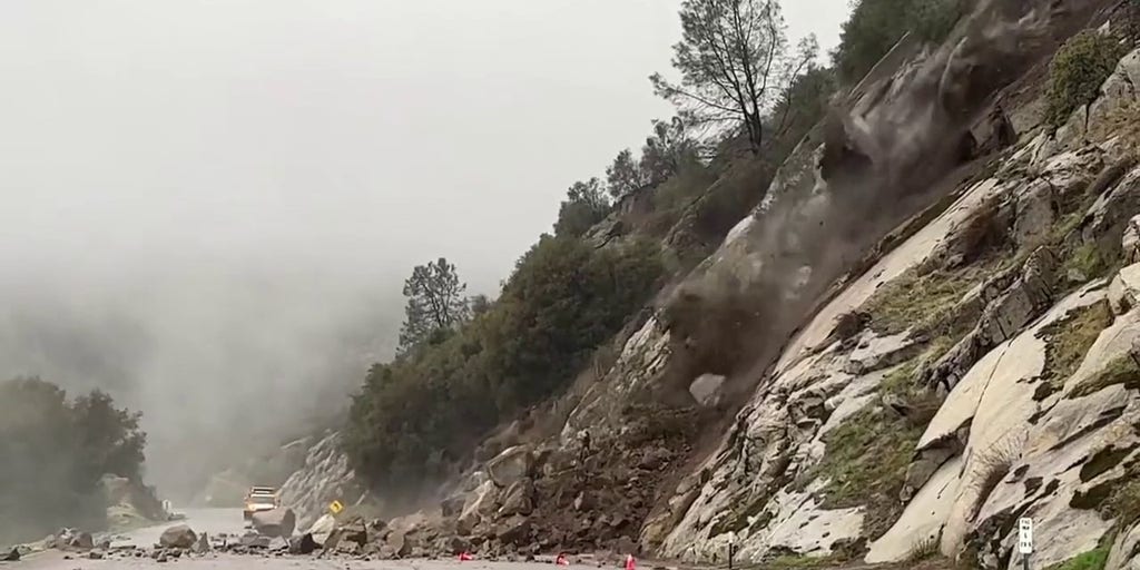 Watch a landslide: Boulders tumble down on a California freeway ...