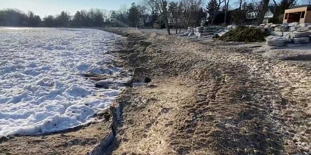 Watch: Low ice cover on Lake Erie beach reveals sand and shells ...