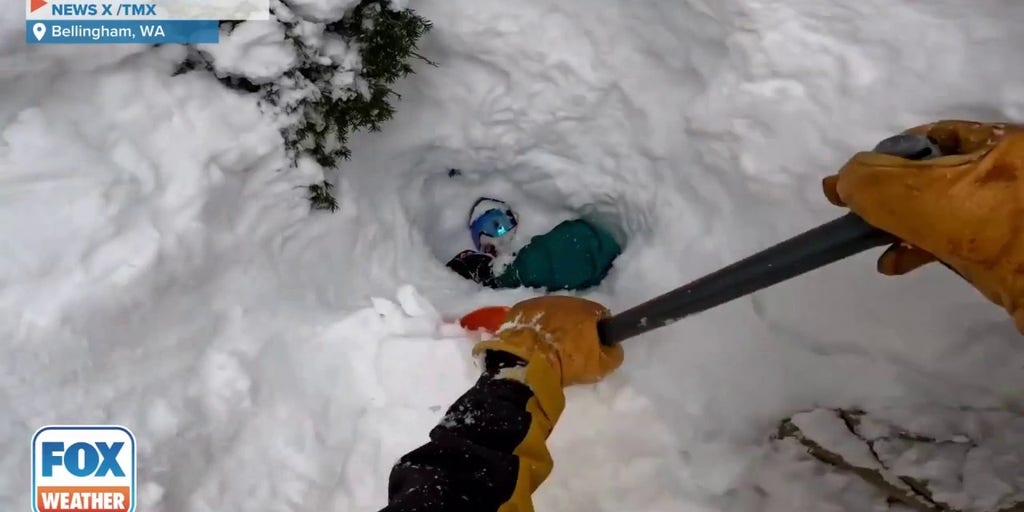 Snowboarder buried alive in snow rescued by skier in WA | Latest ...