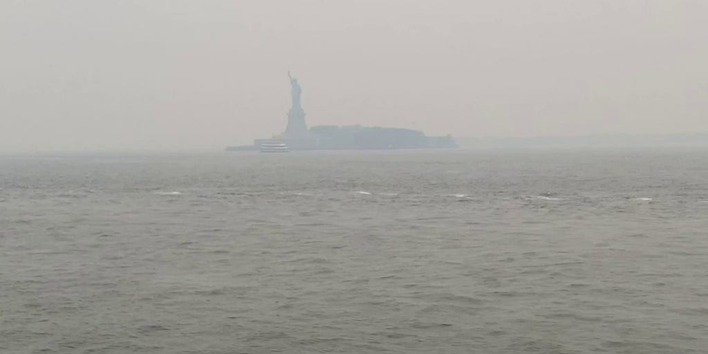 Wildfire smoke shrouds Statue of Liberty as air quality hits 'hazardous ...