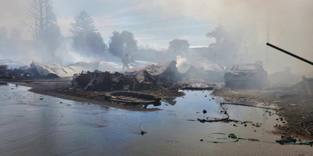 At least a dozen homes damaged by Washington state brush fire | Latest ...