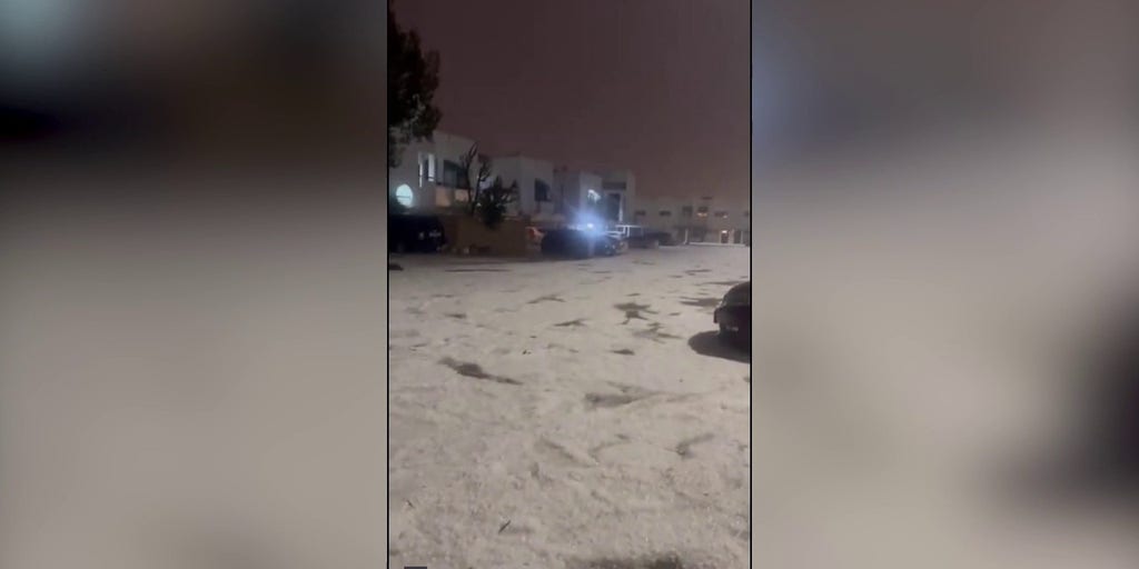 Desert residents stunned by rivers of hail in rare UAE weather event ...