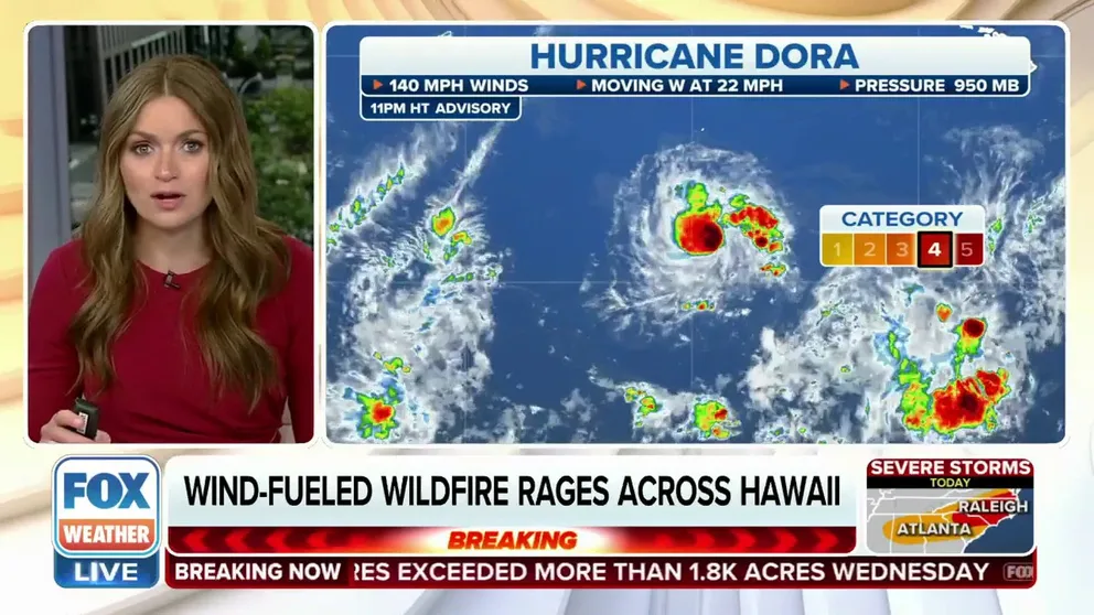Hurricane Dora continues to trek westward in open Pacific Ocean ...