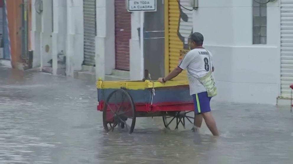 Streets along Colombian coast covered in water during Tropical Storm ...