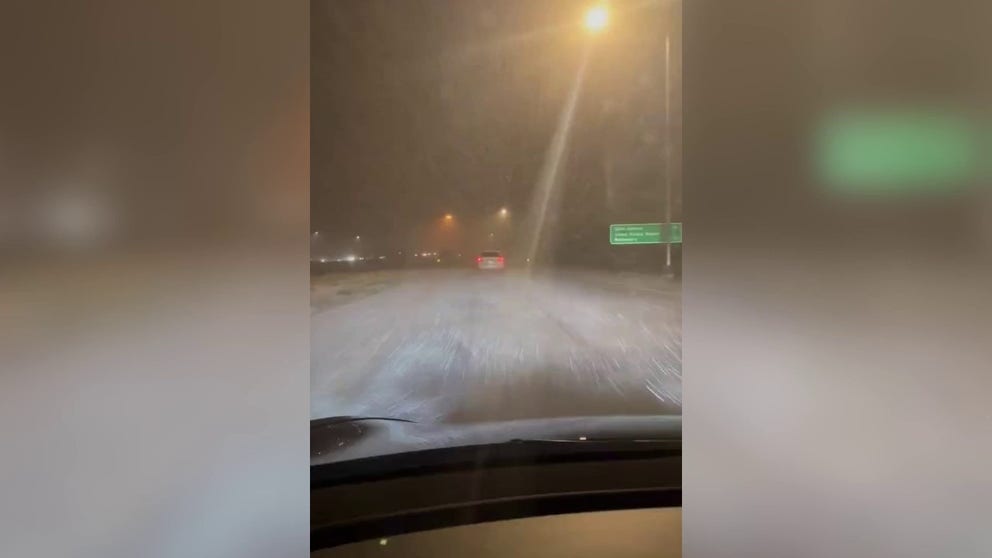 Roads, bridges begin to ice over as snow falls across Denver on ...