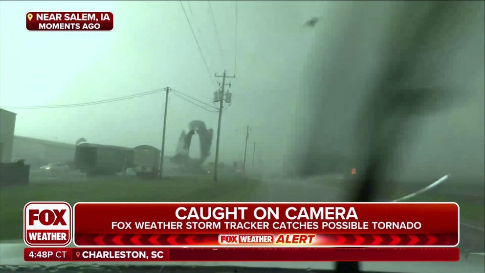 Watch: Silo thrown by possible tornado narrowly misses storm chaser ...