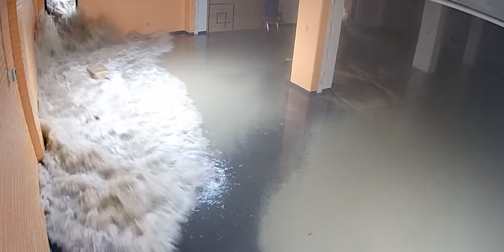 Watch: Flash flood swarms Indiana school, fills basement in torrent of ...