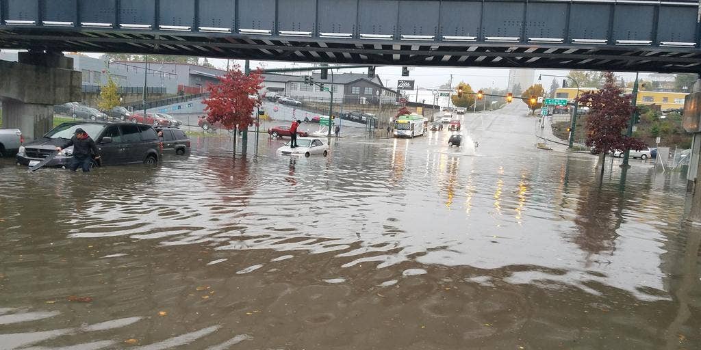 Atmospheric river's soaking rains trigger urban flooding around Seattle ...