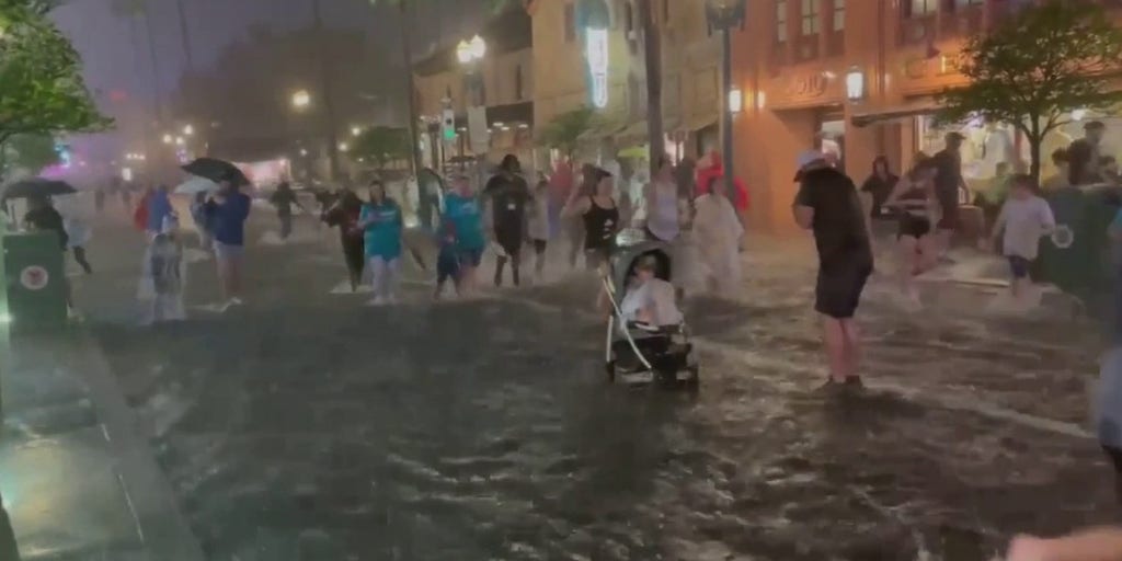 Flooding in Disney, downed trees in New York and snow in New England ...