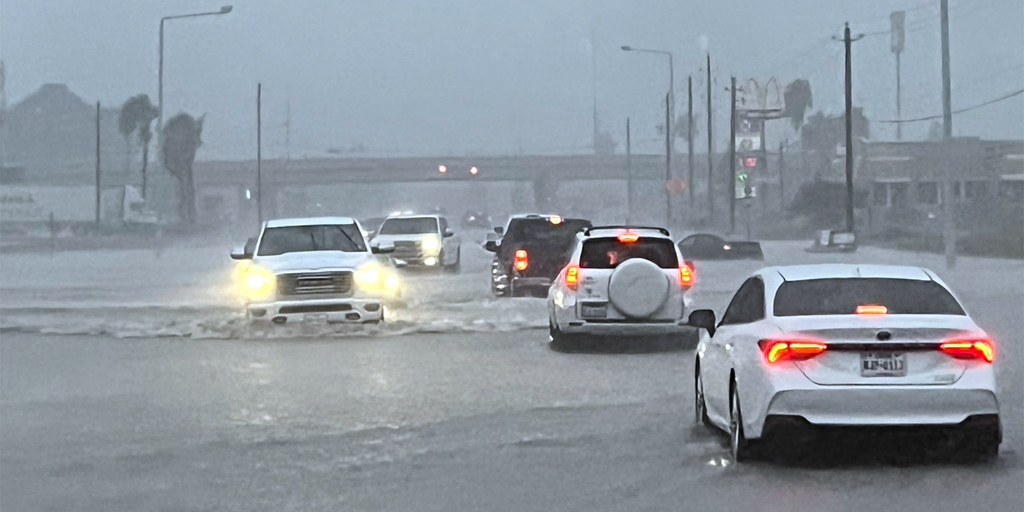 Tropical disturbance continues to produce flash flooding as it spins ...