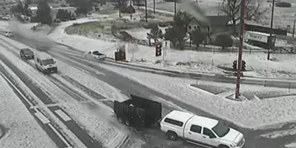 Hail covers ground around Denver metro amid Tornado Warnings on ...