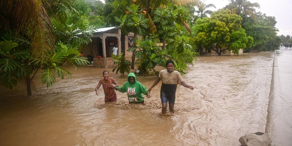 Torrential rain causes deadly flash flooding in Haiti leaving thousands ...
