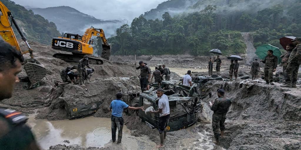 Nearly 20 dead, 100 missing in India flooding after heavy rain causes ...