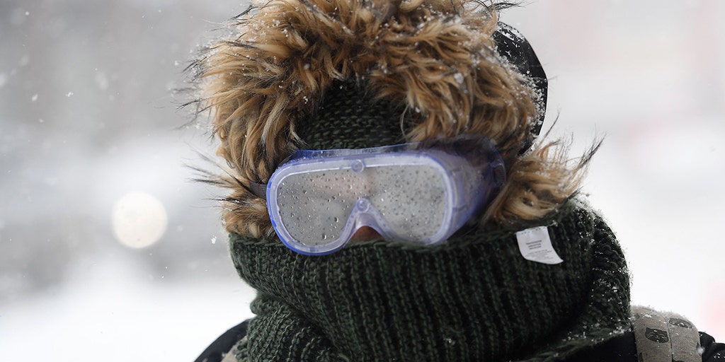 Polar vortex grips much of US as Midwest faces life-threatening wind ...