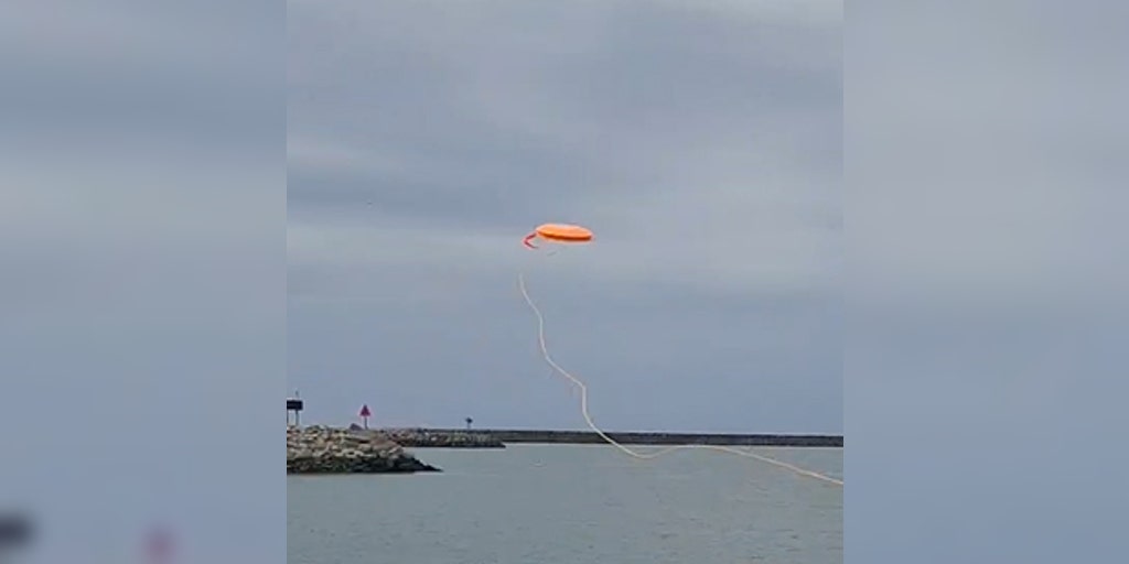 Rescue 'Frisbee' toss saves man trapped in San Diego flash flood | Fox ...