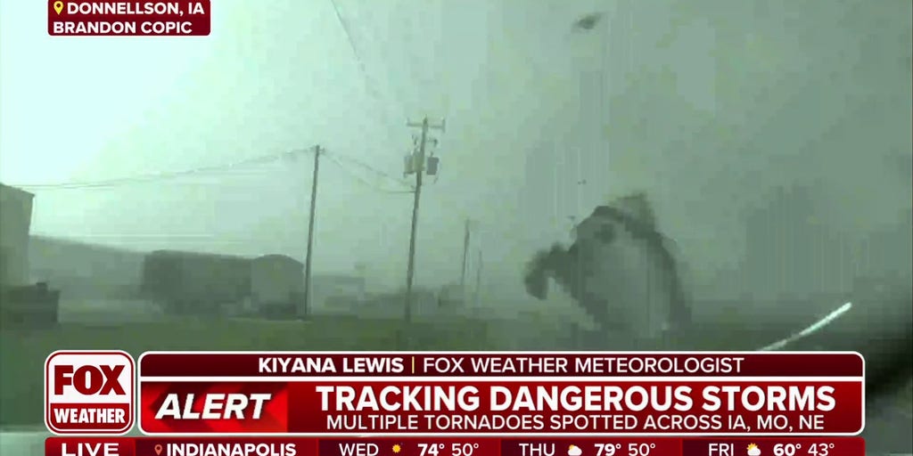 Exclusive video: A metal grain silo narrowly misses storm chaser in ...
