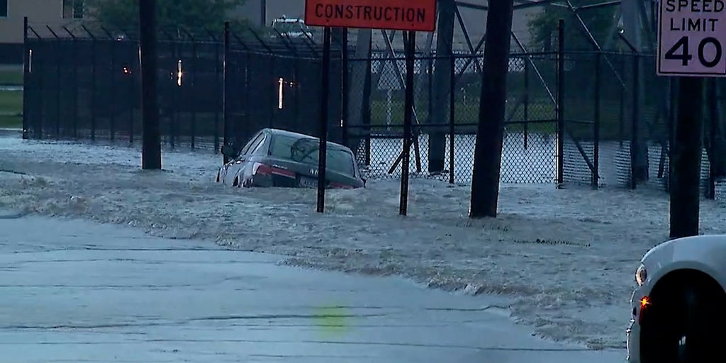 Heavy rain floods parts of Indianapolis metro, submerging multiple ...