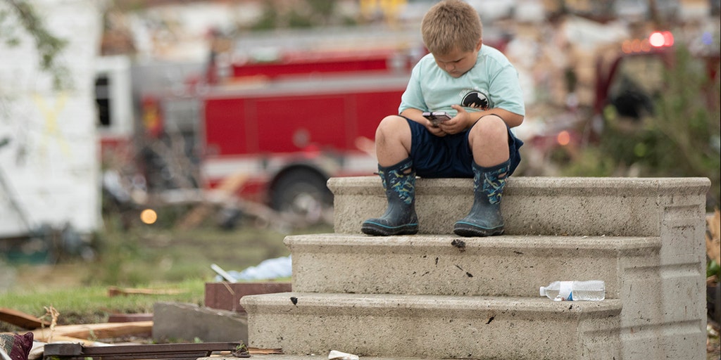 Powerful images capture deadly devastation from tornado's aftermath in ...