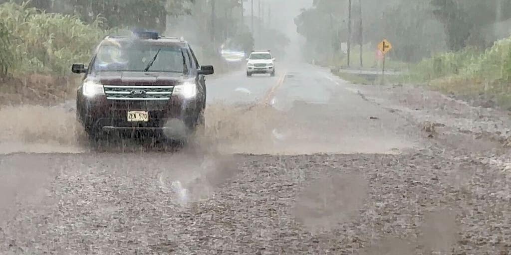Tropical Storm Hone moving away from Hawaii after dumping over 2 feet ...