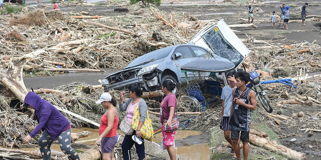 Death count climbs as Tropical Storm Trami strikes the Philippines ...