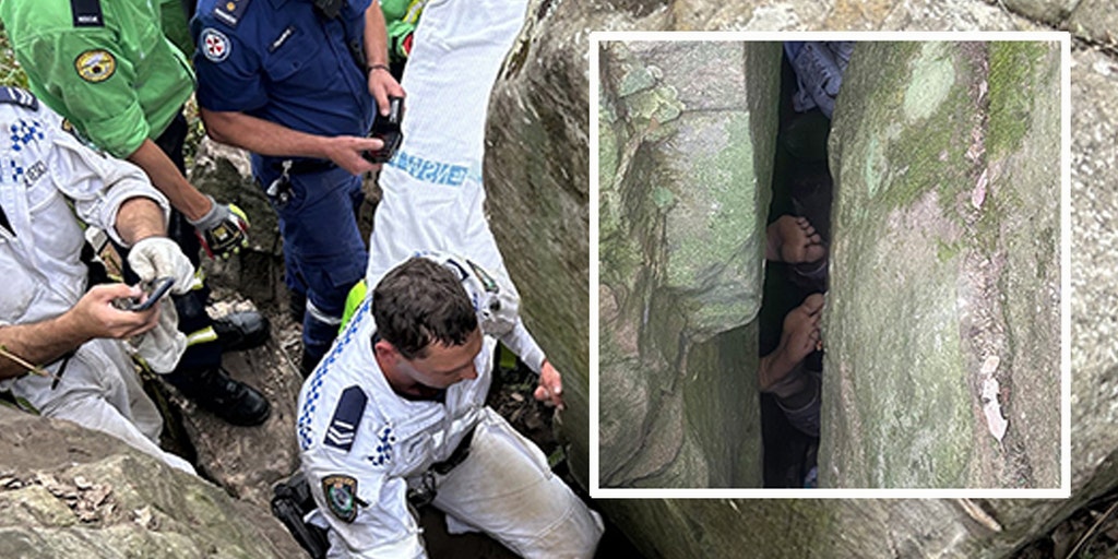 PHOTOS: Woman rescued after wedged between boulders in nightmare 7-hour ...