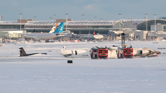 Delta flight from Minnesota crash lands upside down in Toronto, photos show | Fox Weather