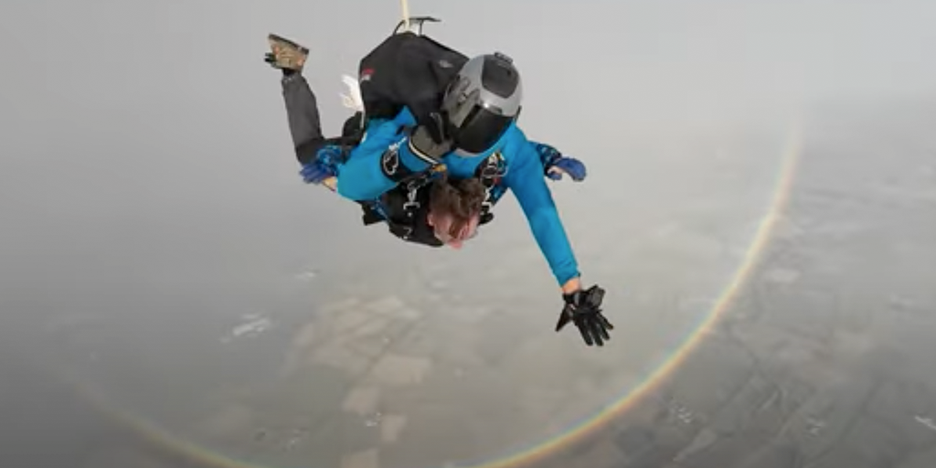 See it: Skydivers capture true shape of a rainbow as they plummet ...