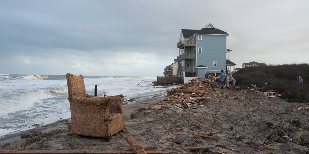 PHOTOS: Massive debris piles along Outer Banks after 9 homes crumble ...