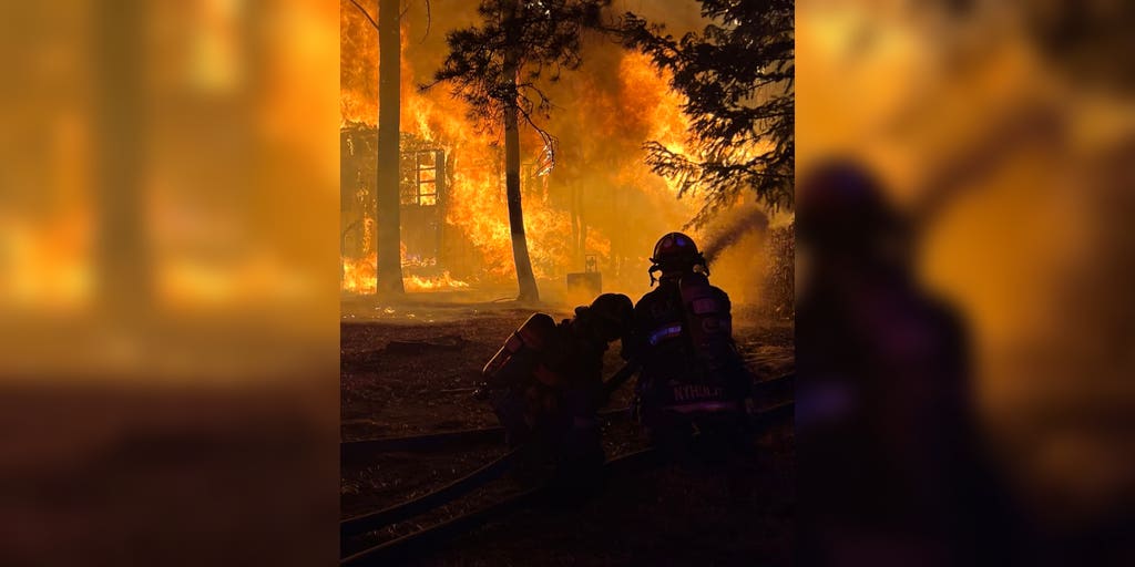 WATCH: First responders run towards raging Colorado house fire amid ...